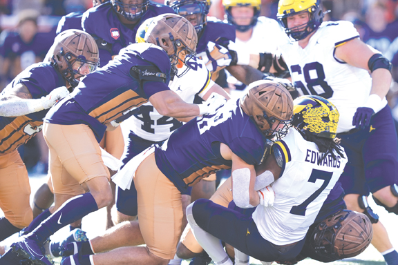 Illinois Fighting Illini football team pulls out rare win over Michigan ...